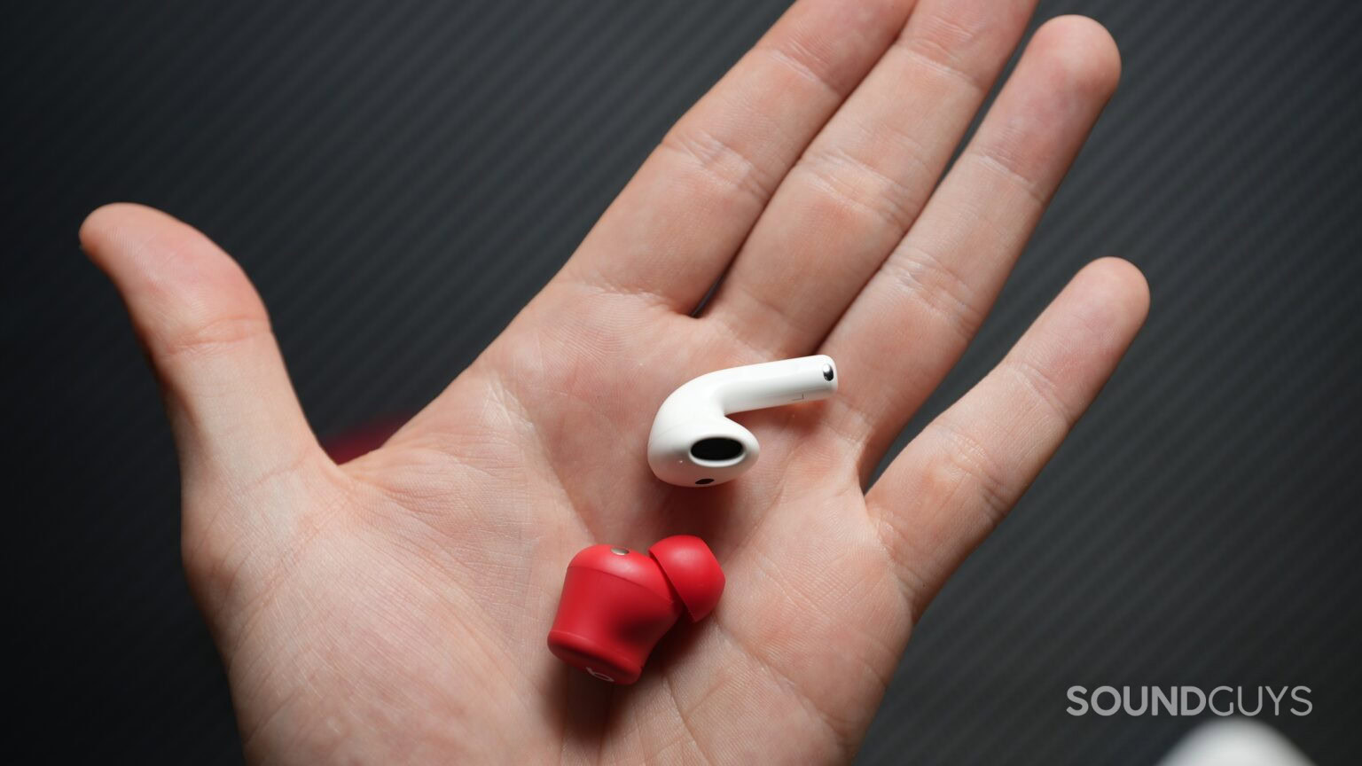 AirPods 4 vs Beats Solo Buds - SoundGuys